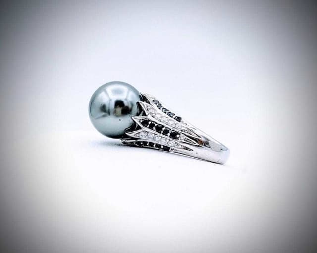 Andradite Garnet Value, Price, and Jewelry Information - Gem Society