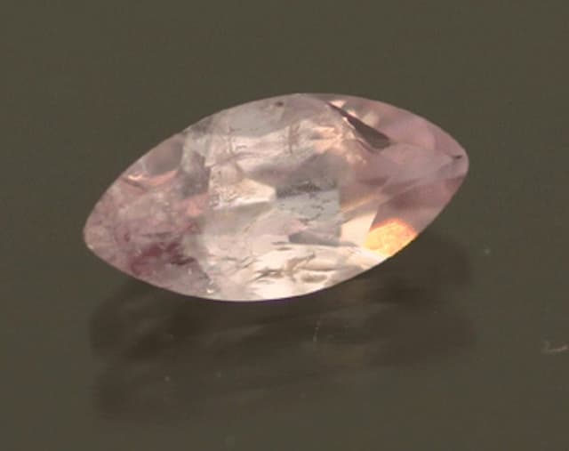 Axinite Value, Price, and Jewelry Information - Gem Society